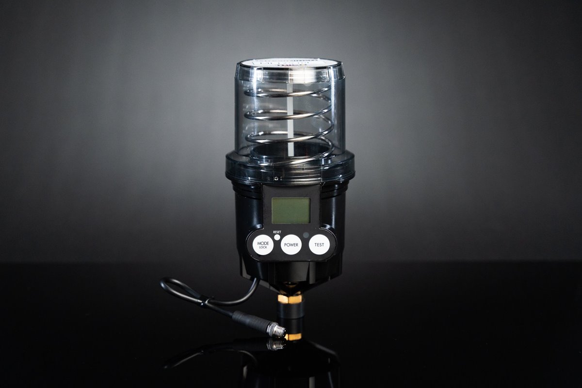 Automatic Grease Dispenser with Vibration Sensor | Trico Corporation